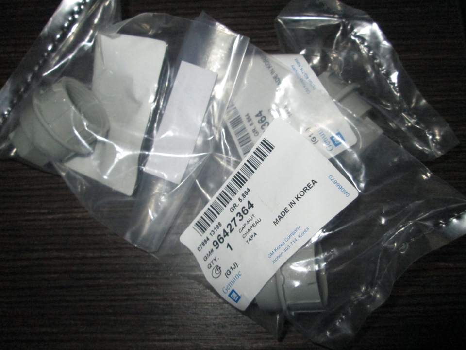 Замена пластиковых болтов на колпаках — Chevrolet Aveo 5-door (1G), 1,5 ...