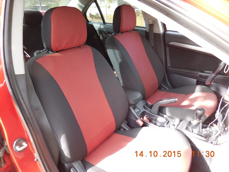 Чехлы. — Mitsubishi Lancer X, 1,8 л, 2008 года | аксессуары | DRIVE2