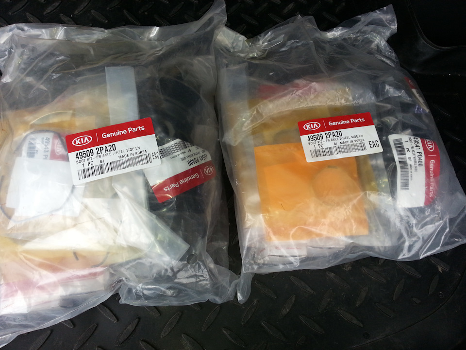 Замена пыльников приводов передней оси, подшипника промвала и пыльников ...