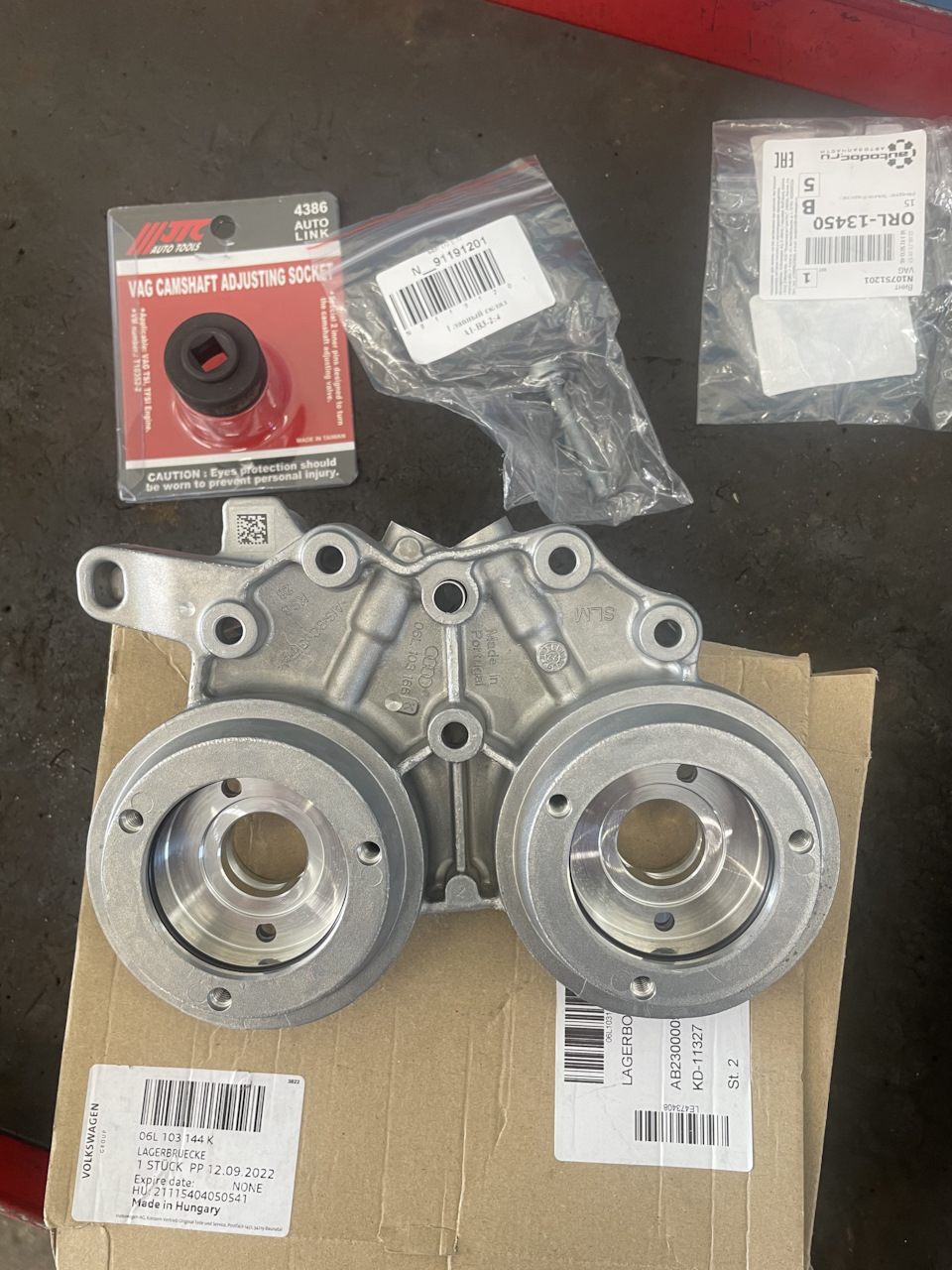 06L103144K Опорный кронштейн VAG | Запчасти на DRIVE2