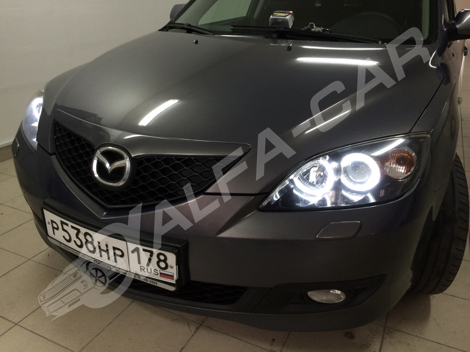 Mazda 3. Газоразрядные ангельские глазки — Alfa-Car на DRIVE2