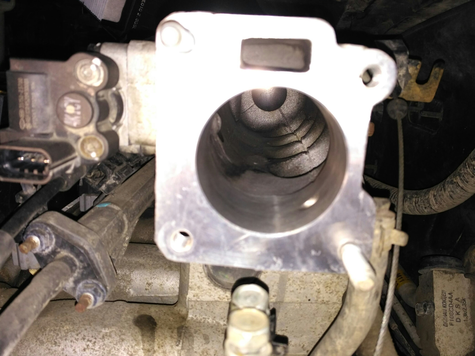 Чистка заслонки и датчика ХХ, а также прошприцевал крестовину кардана ...