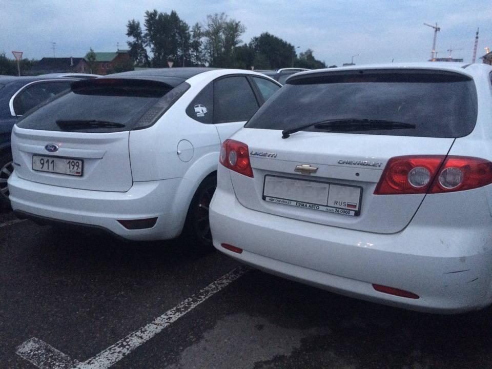 Диффузор ST и левый задний ход белого цвета — Ford Focus Hatchback II ...