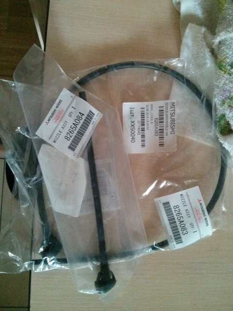 8265A083 Форсунка омывателя Mitsubishi | Запчасти на DRIVE2