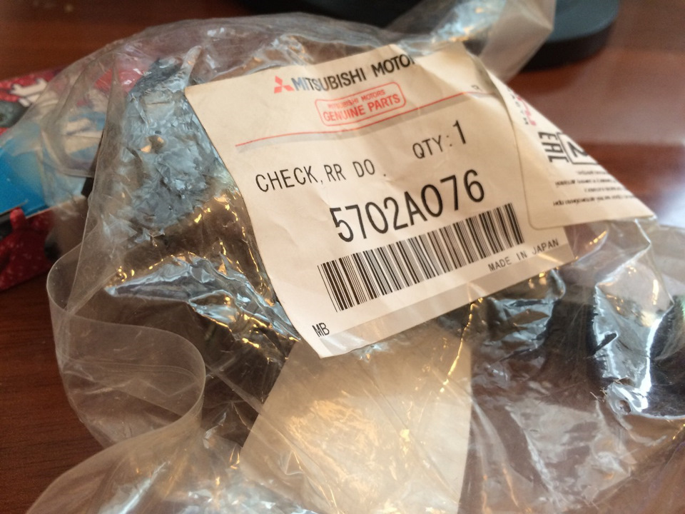 5702A076 Фиксатор задней двери Mitsubishi | Запчасти на DRIVE2