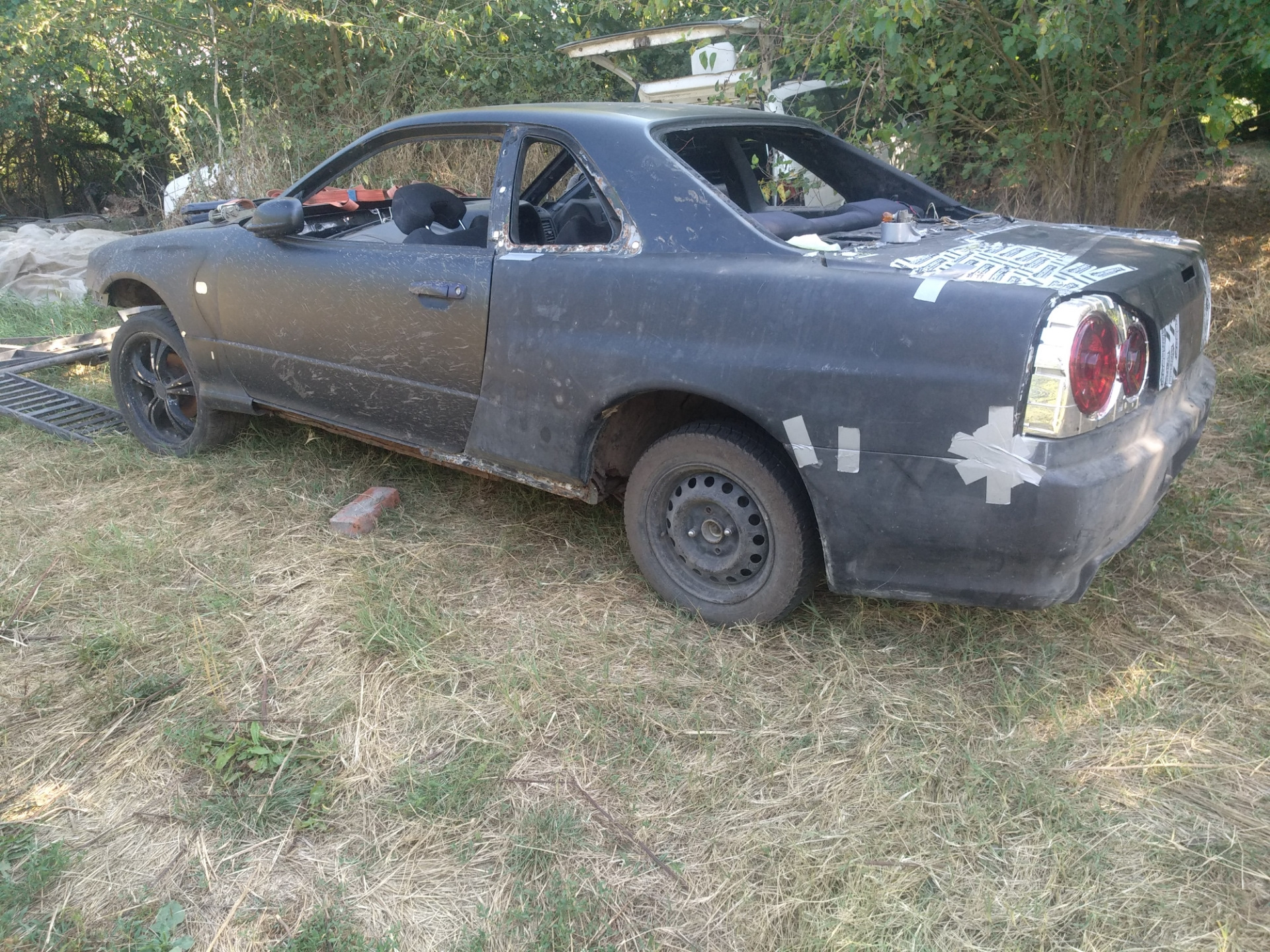 Заднее расширение от Лаки — Nissan Skyline (R34), 2,5 л, 1998 года | тюнинг | DRIVE2