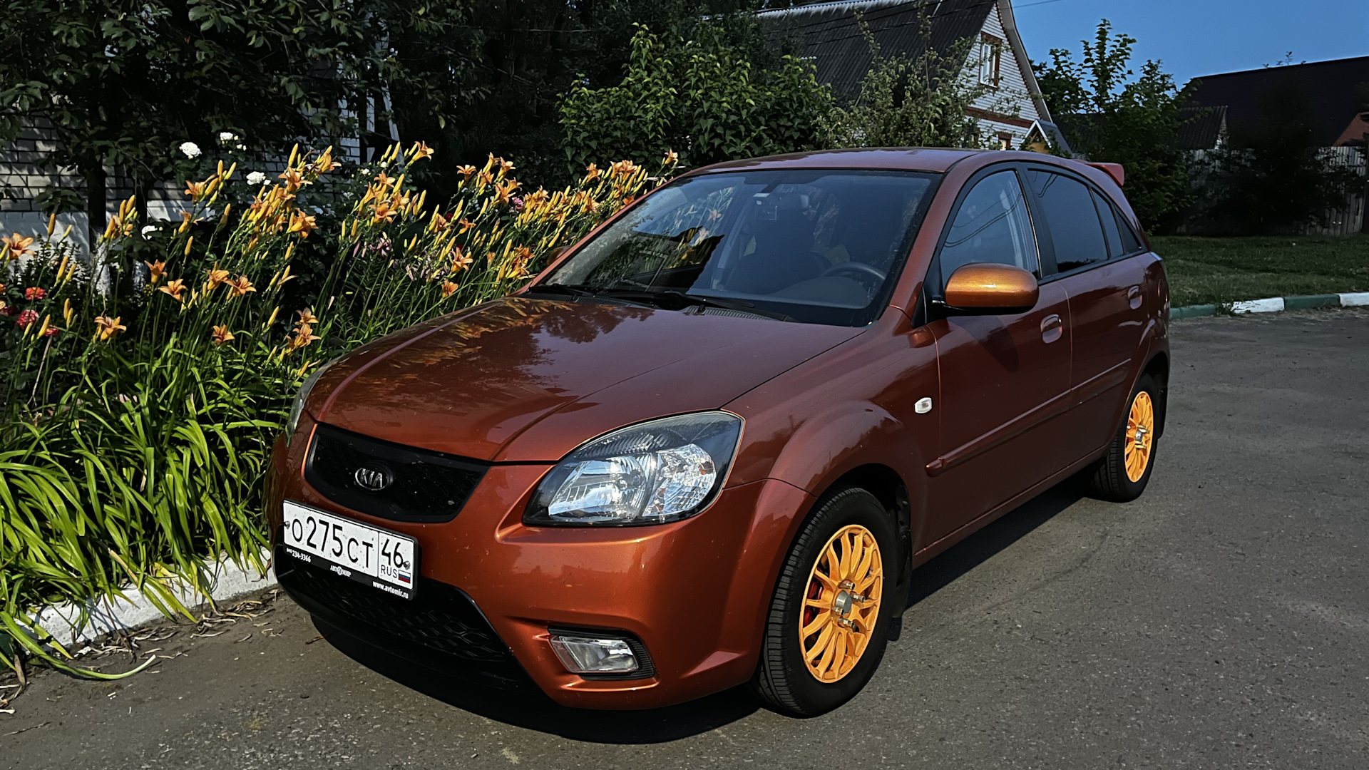 KIA Rio (2G) 1.4 бензиновый 2011 | 2 Sunset Orange на DRIVE2