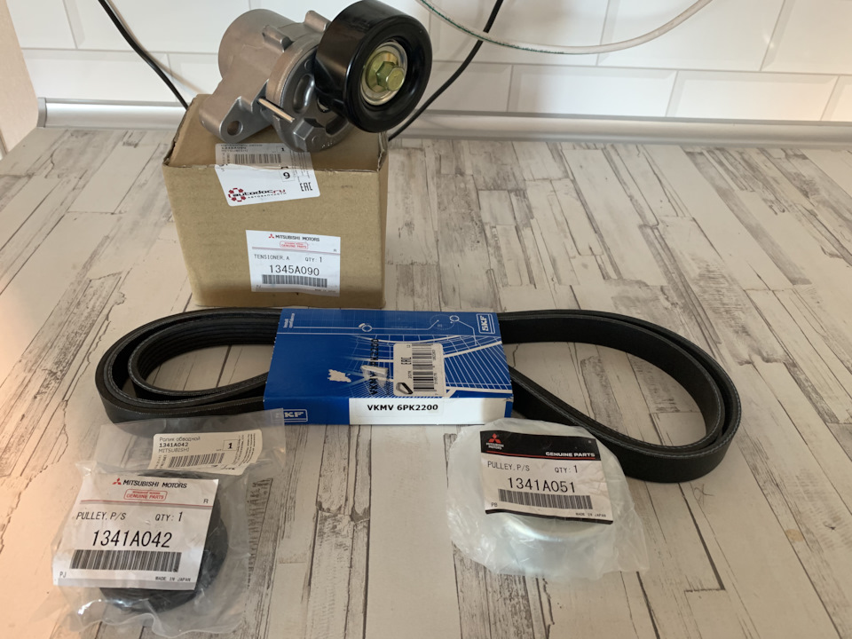 1345A090 Натяжитель привода ремня генератора Mitsubishi | Запчасти на ...