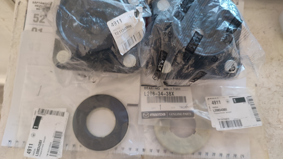 Замена опор и подшипников передних амортизаторов — Mazda CX-7, 2,3 л ...