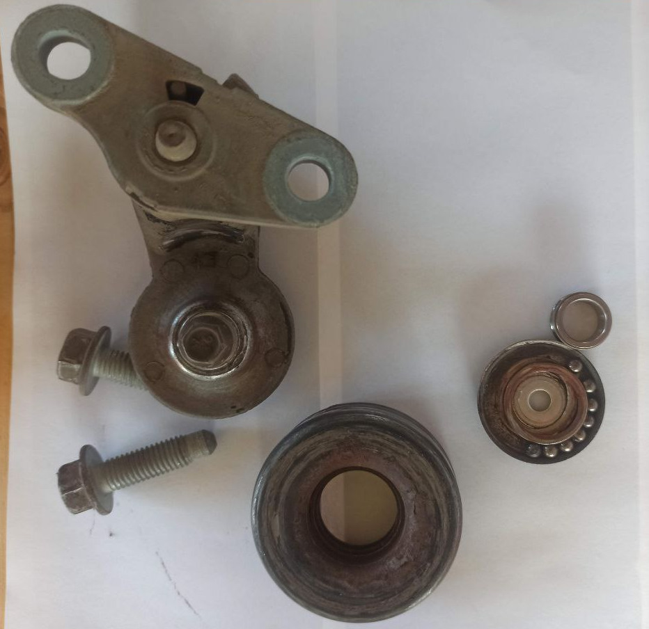 Замена подшипников паразитного ролика и ролика натяжилеля Chevrolet ...