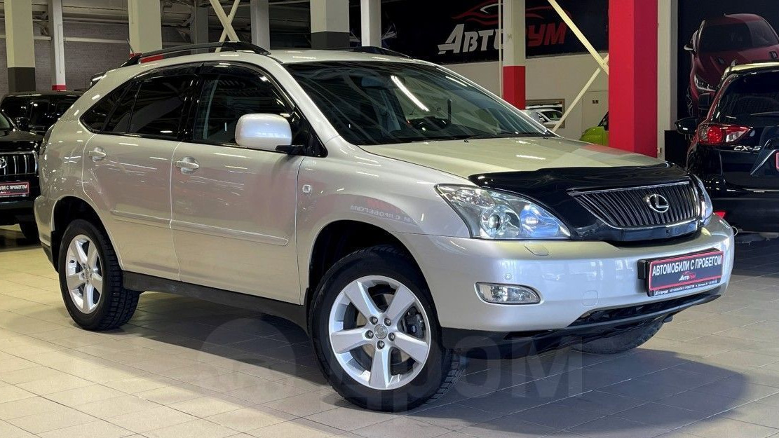 Lexus RX (2G) 3.5 бензиновый 2007 | 3,5 серебристый на DRIVE2