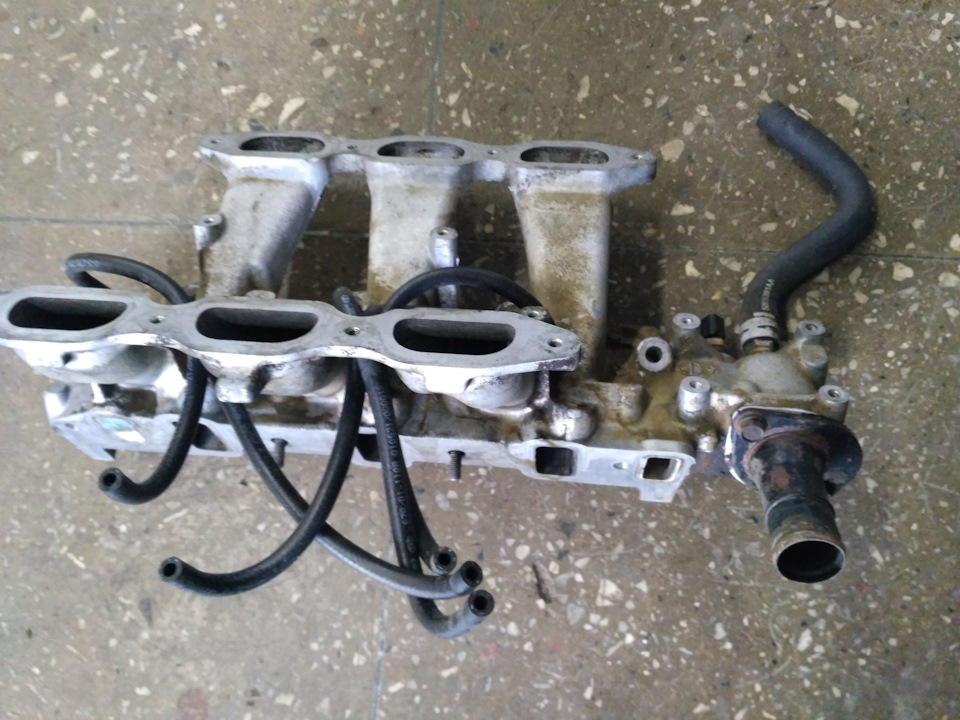 Замена:прокладок ГБЦ, термостата, прокладки впускного коллектора ...