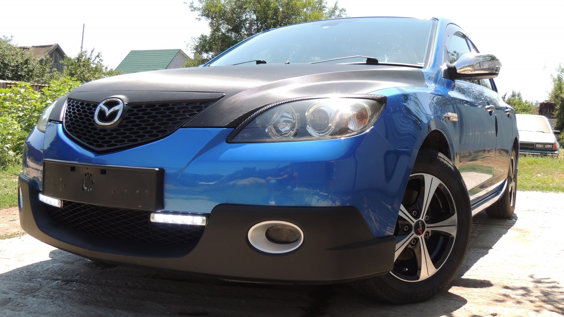 Mazda Axela (1G) 1.5 бензиновый 2004 | "Aurora Blue Beauty" на DRIVE2