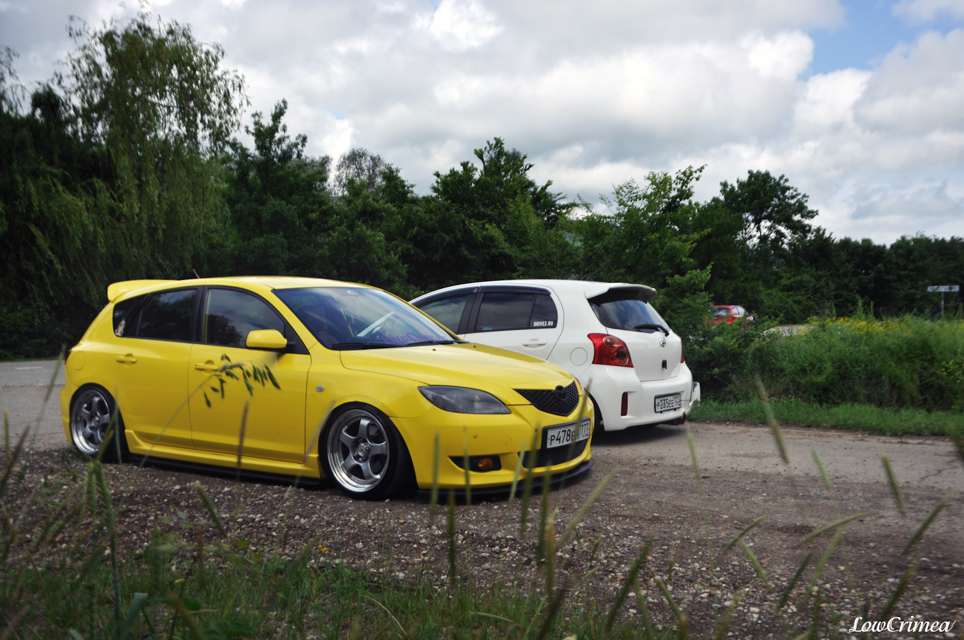 White & Yellow. Toyota Vitz RS & Mazda 3. Double stance. Photo by ...