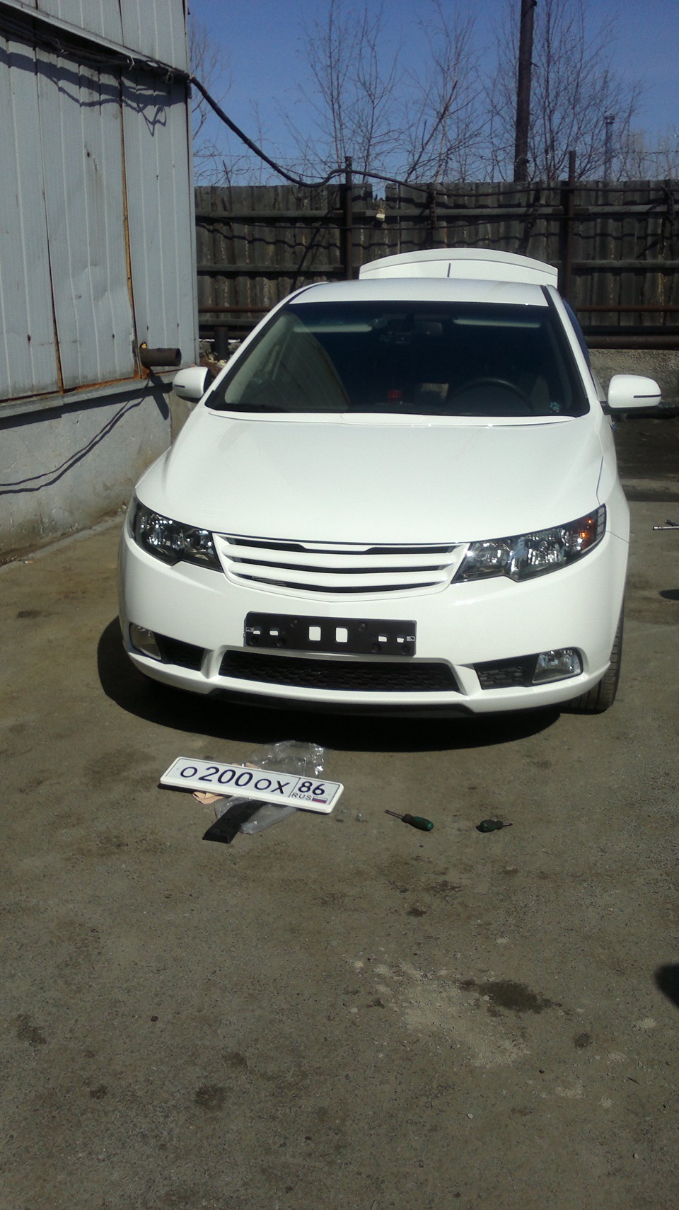 Подиум под передний номер. — KIA Cerato (2G), 2 л, 2011 года ...