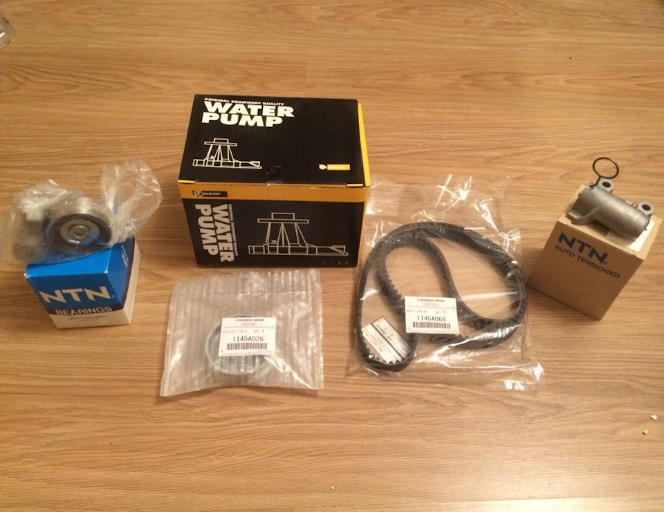 1145A026 Ролик натяжителя OEM Mitsubishi | Запчасти на DRIVE2