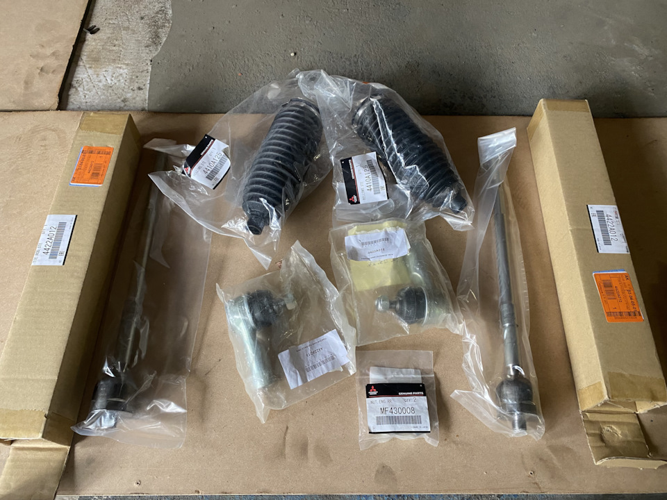 Замена тяг, наконечников и пыльников — Mitsubishi Lancer X, 2 л, 2008 ...