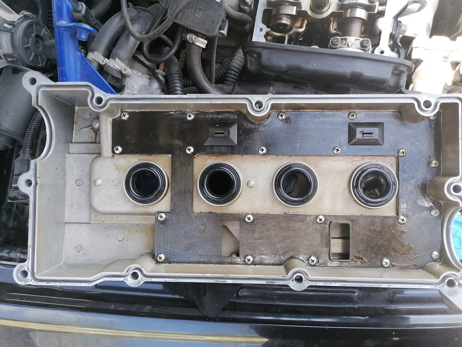 Замена сальников свечных колодцев (KOS065)/ Замена прокладки клапанной ...