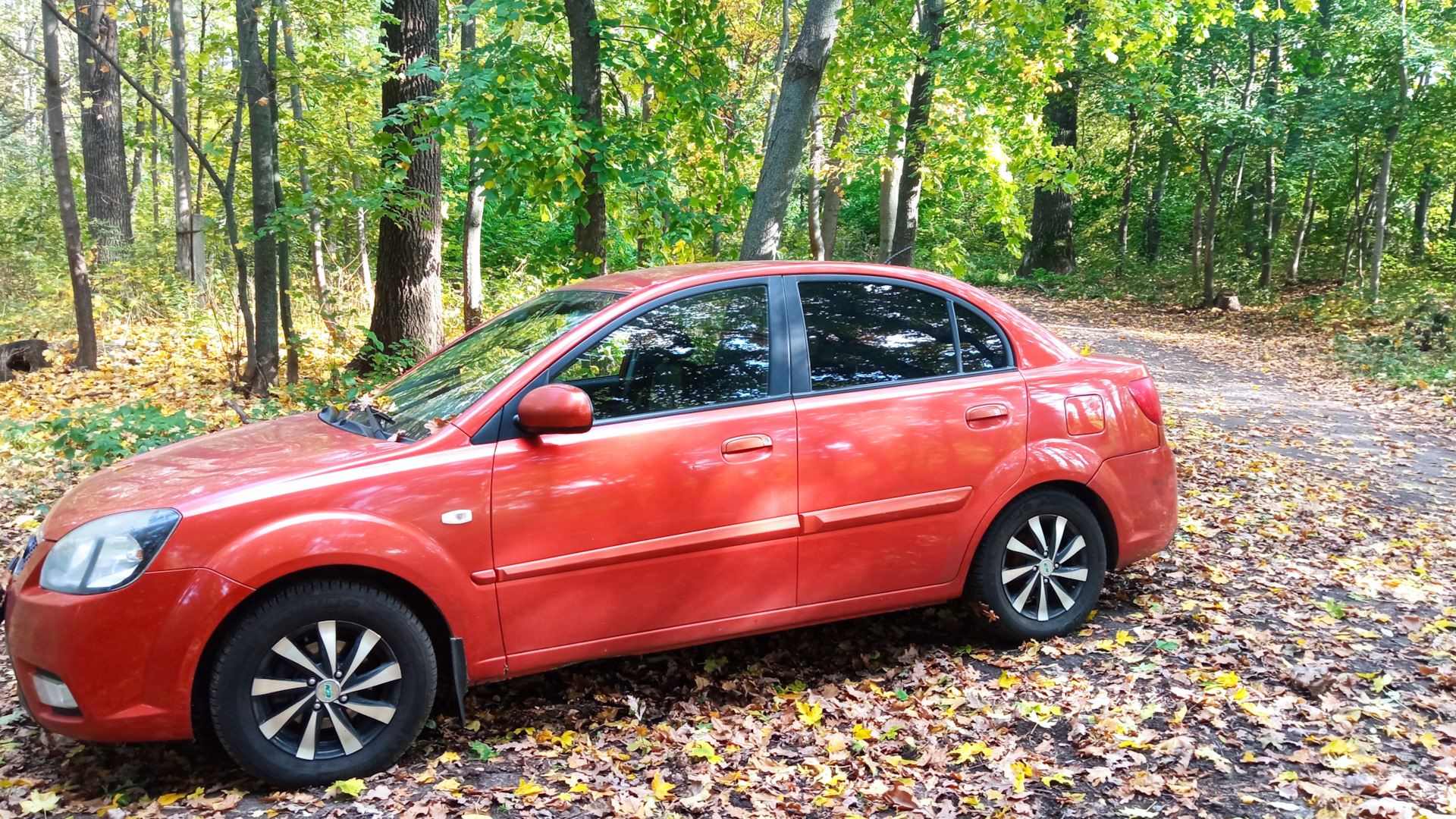 KIA Rio (2G) 1.4 бензиновый 2010 | FL Sunset Orange на DRIVE2