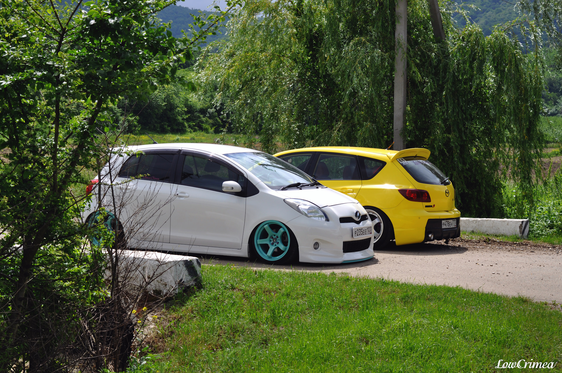 White & Yellow. Toyota Vitz RS & Mazda 3. Double stance. Photo by ...