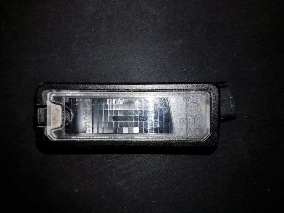 1K8943021 Фонарь освещения номерного знака VAG | Запчасти на DRIVE2