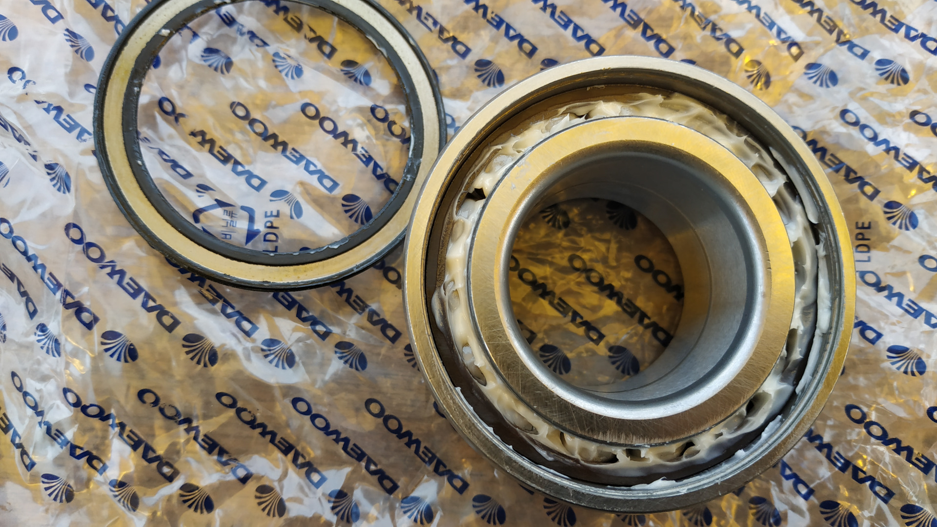 DAEWOO 96995000. Подшипник передней ступицы. GM 94515437. Гайка ...