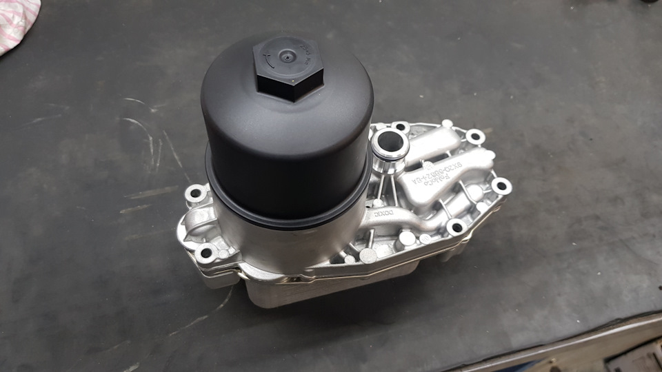 LR040738 МАСЛЯНЫЙ ФИЛЬТР С КУЛЕРОМ Jaguar Land Rover | Запчасти на DRIVE2