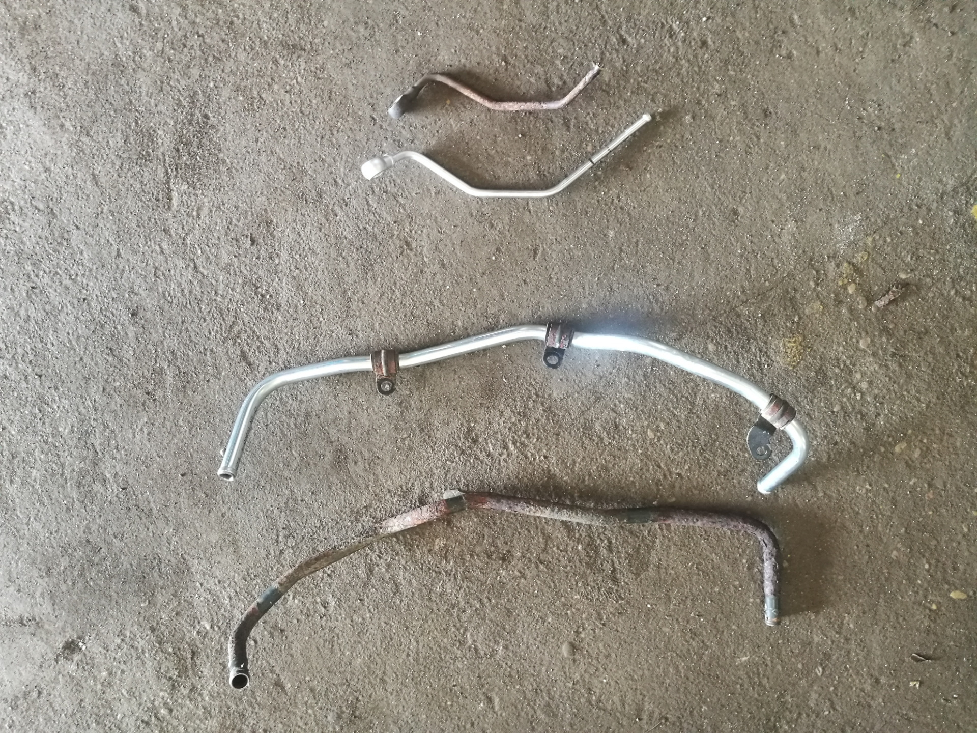 Колодки перед, трубки охлаждения АКПП, наружный правый пыльник шруса ...